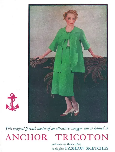 Actress Binnie Hale wearing a bright green swagger suit