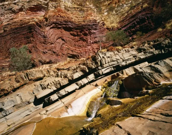 Australia South Fortescue river flows through ironstone