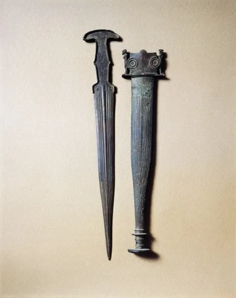 Bronze sword decorated with small anthropoid figures