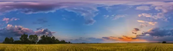 Panorama of a colorful sunset over a prairie in Alberta