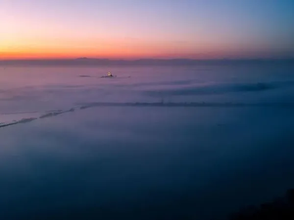 The golden island. Grado Island from above at sunset